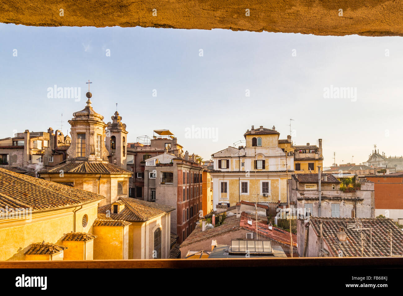 overlooking the rooftops of Rome, historic palaces, Catholic churches ...