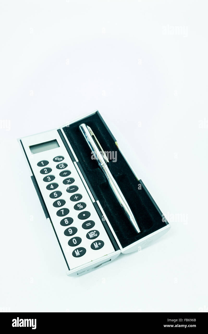 Pocket box of calculator and pen isolated on white background, stock ...