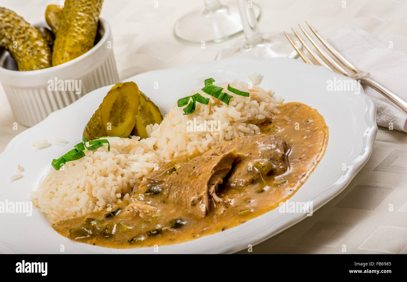 Czech traditional food Znojmo's sauce with gherkin and pork meat and ...