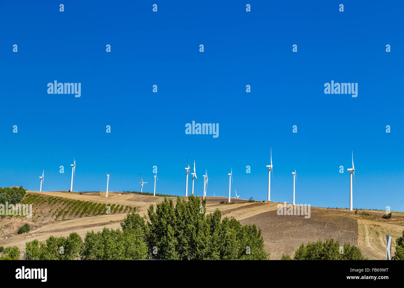 group of white wind turbines in southern Italy Stock Photo - Alamy