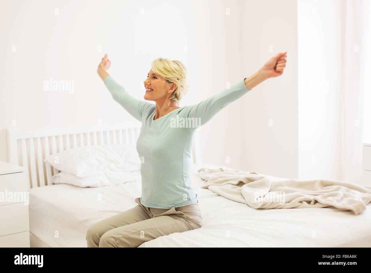 Pretty woman getting up hi-res stock photography and images - Alamy