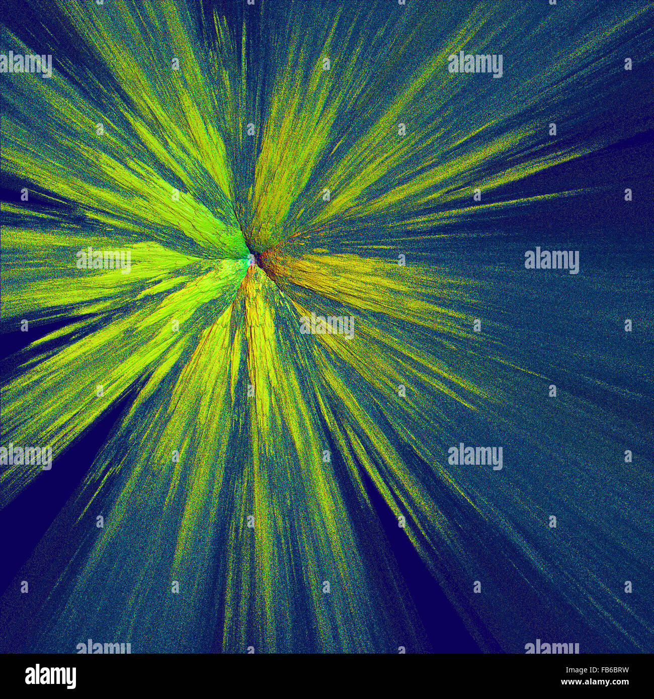 Splash of bright green yellow (chartreuse) color on a blue background ...