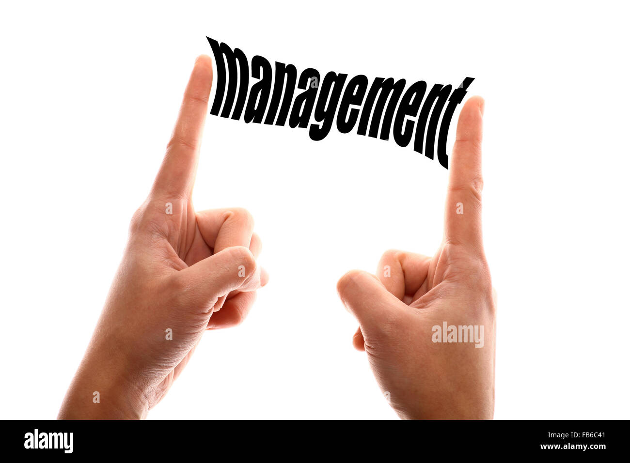 Color horizontal shot of a of a hand squeezing the word "management ...