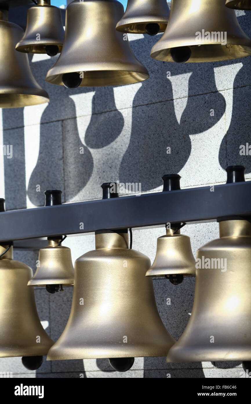 Color image of some various sized bells in a row Stock Photo - Alamy