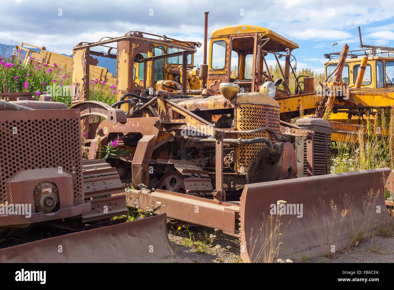 Old rusty and weathered bulldozers. Outdoors horizontal shot Stock ...