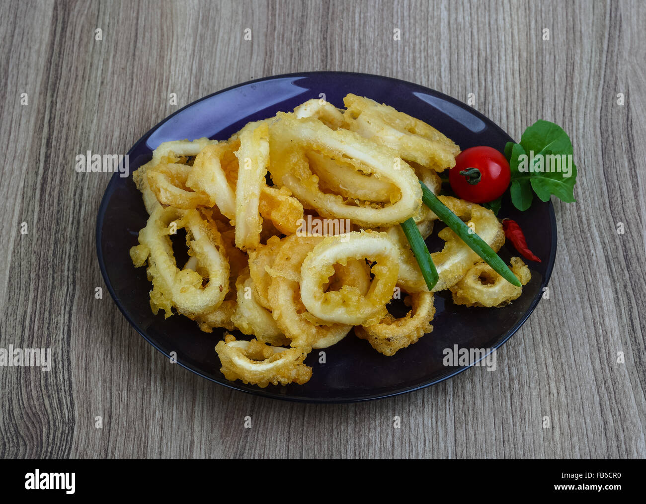 Fried rings squid herbs onion hi-res stock photography and images - Alamy