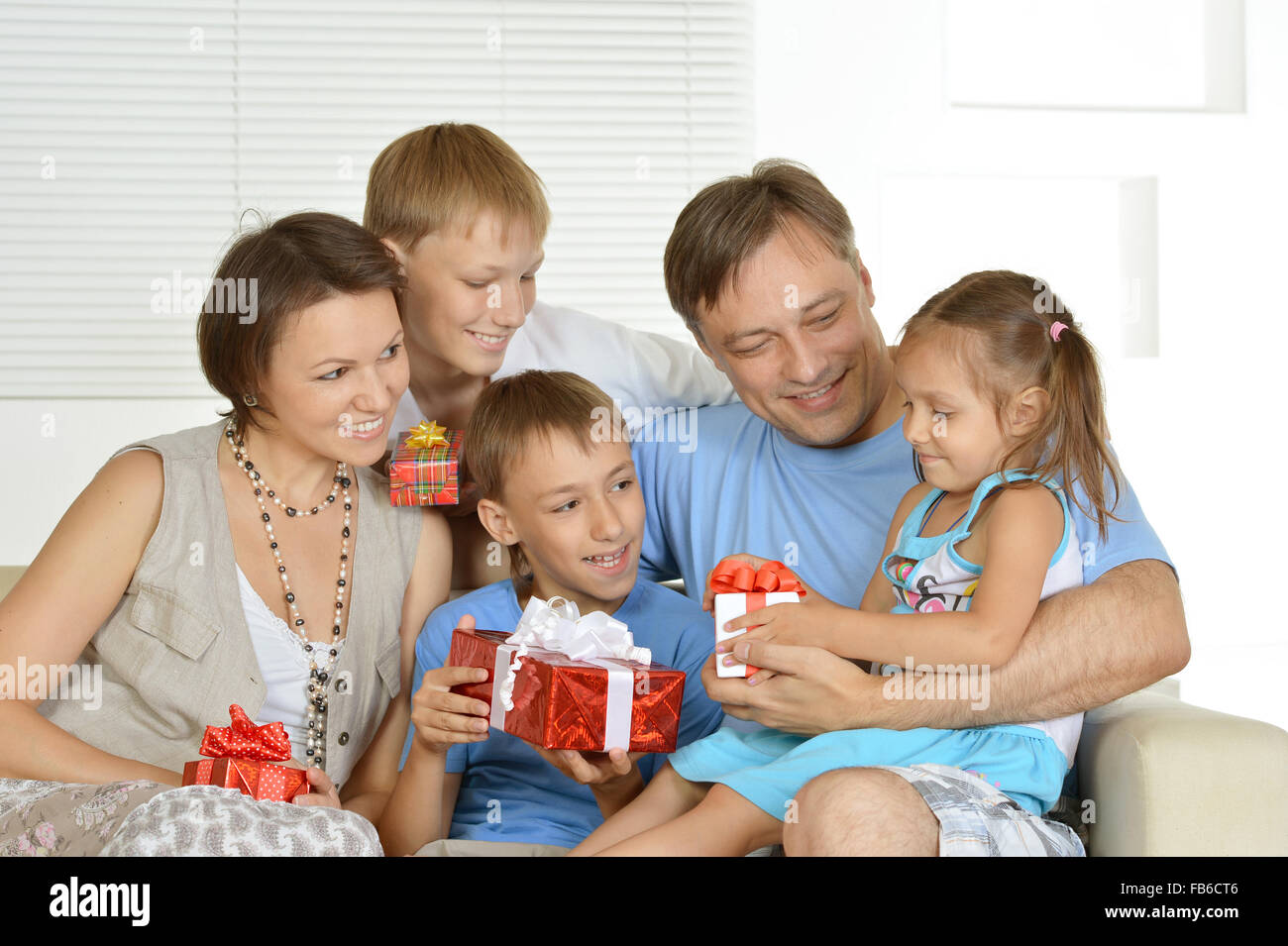 happy Family with gifts Stock Photo - Alamy