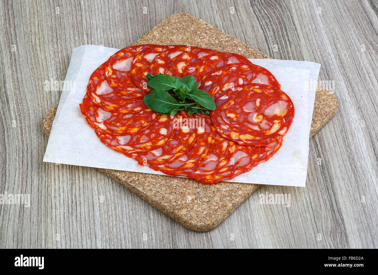 Traditional Spanish salami - Chorizo sausage on the wood background ...