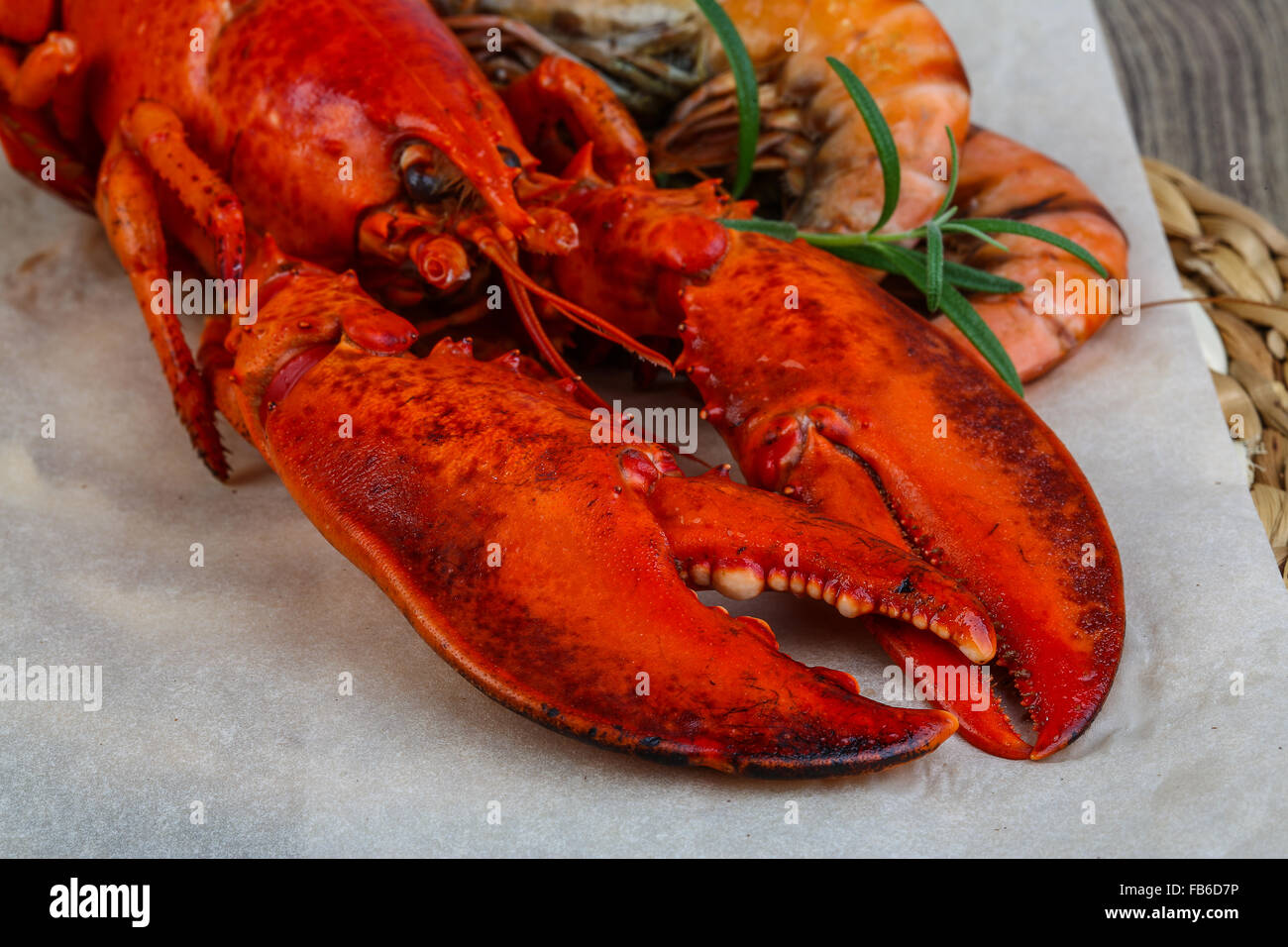 Big cooked lobster and tiger shrimps ready for eating Stock Photo - Alamy