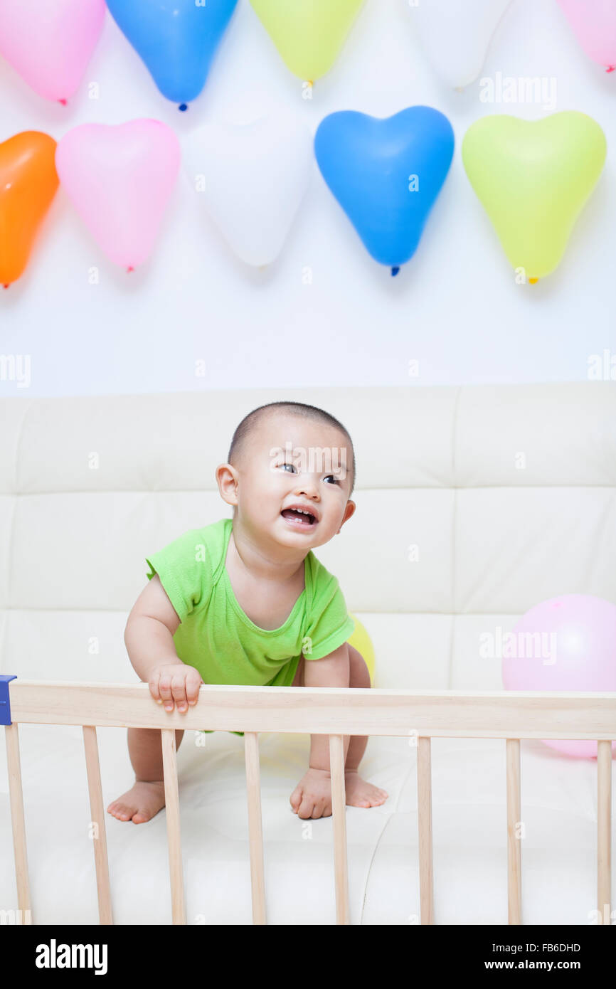 Chinese baby boy playing on a sofa, shot in Beijing, China Stock Photo ...