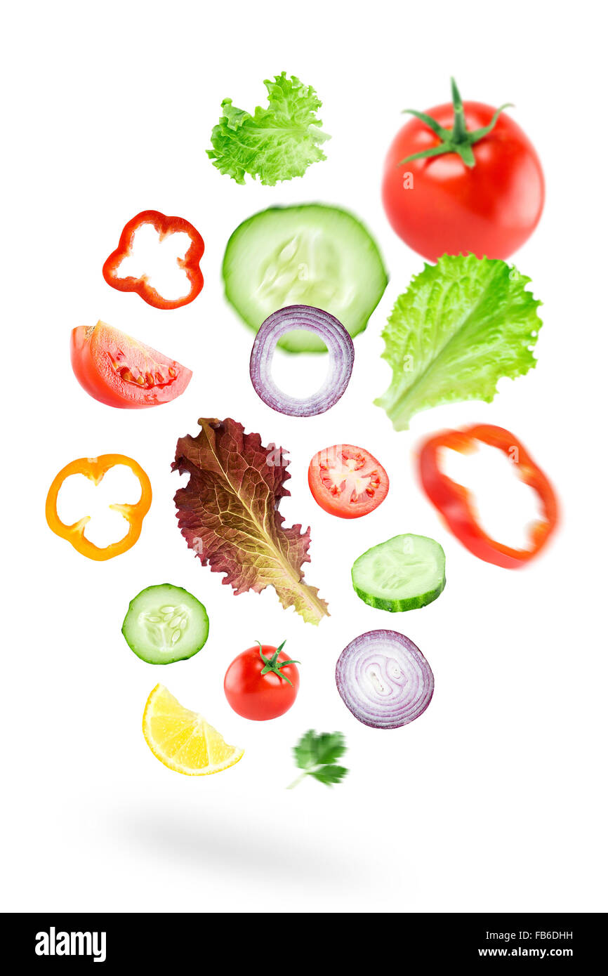 Falling fresh vegetables on white background Stock Photo - Alamy