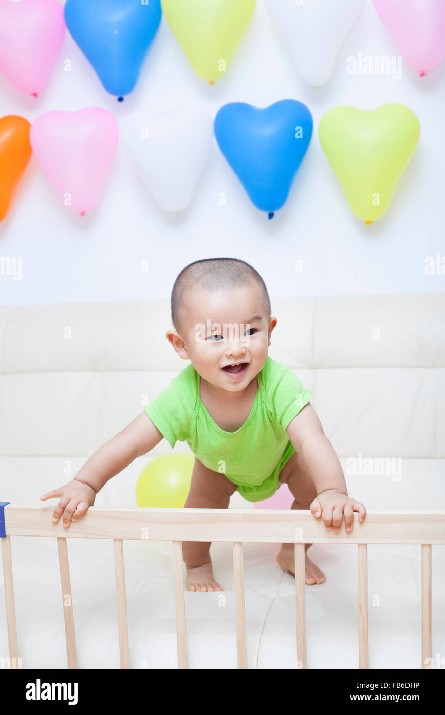 Chinese baby boy and colorful balloons, shot in Beijing, China Stock ...
