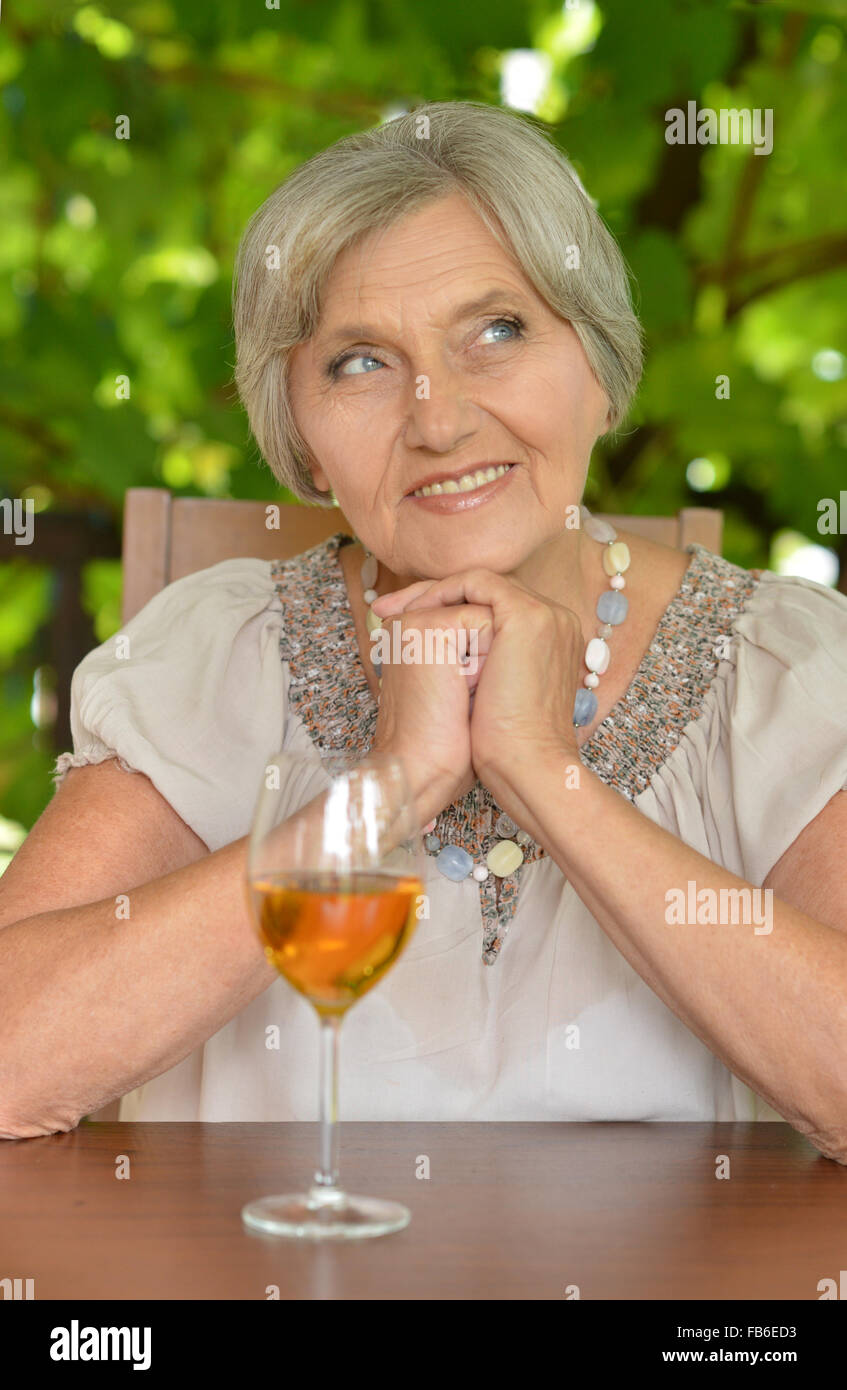 woman sitting at a table Stock Photo - Alamy woman sitting at a table Stock Photo - Alamy