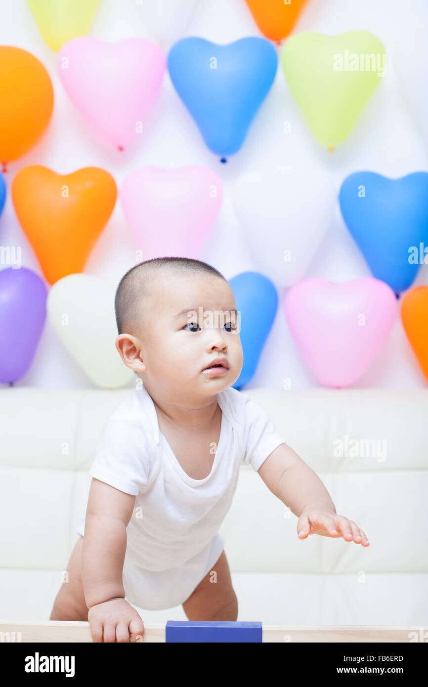 Chinese baby boy and colorful balloons, shot in Beijing, China Stock ...