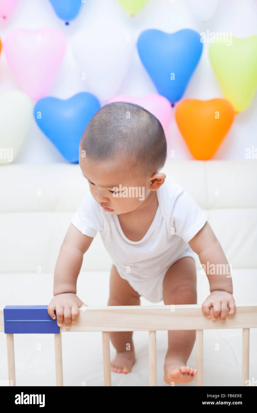 Chinese baby boy and colorful balloons, shot in Beijing, China Stock ...