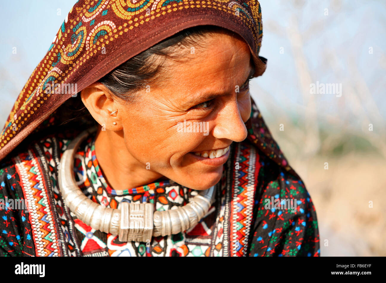 Fakirani Jat tribe, Woman wearing traditional silver jewelry, Kutch ...