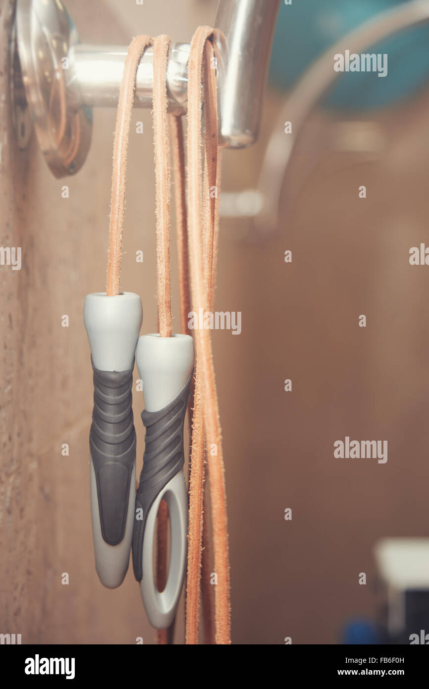 Jump rope in the gym class. Close-up vertical photo Stock Photo - Alamy