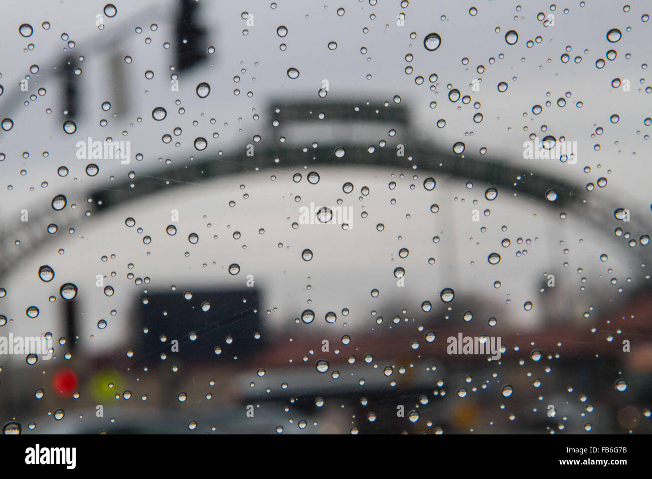 Modesto, CA, USA. 11th Jan, 2016. Rain drops cover a window during a ...