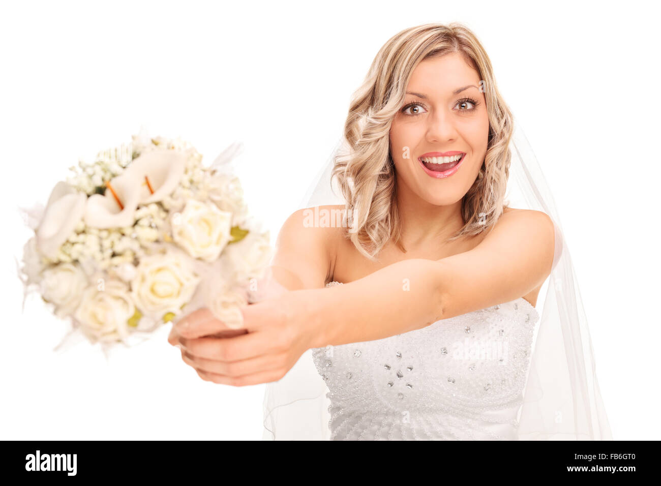 Young excited bride preparing to toss the wedding flower isolated on ...