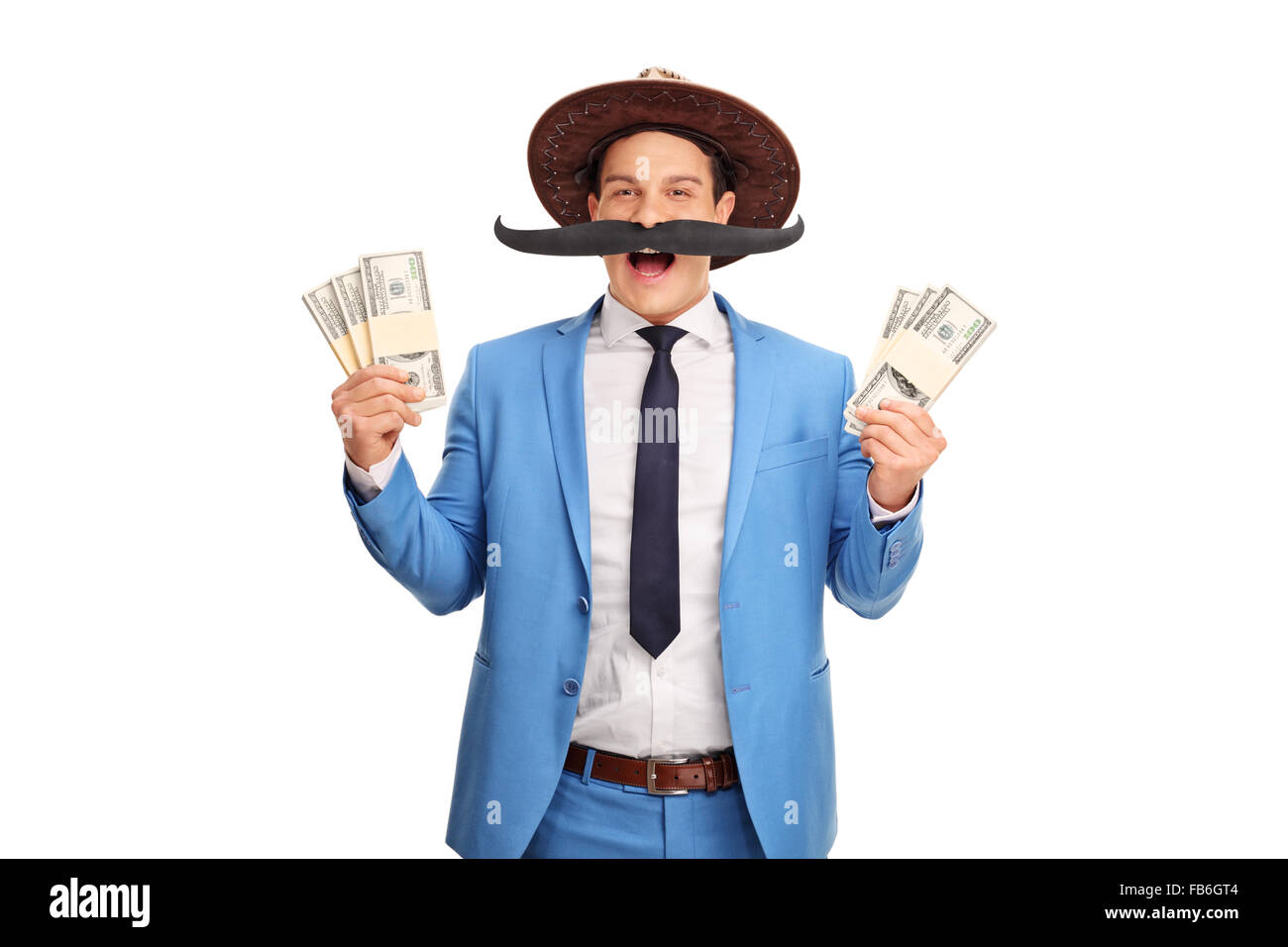 Young man with a fake mustache and a cowboy hat holding few stacks of ...