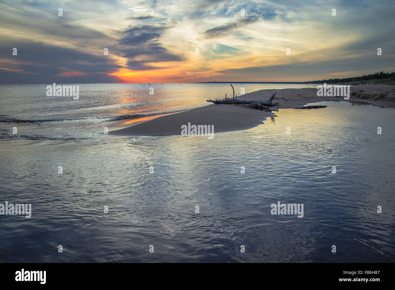 Sandy Sunset Beach Background. Beautiful sunset on the shores of Lake ...
