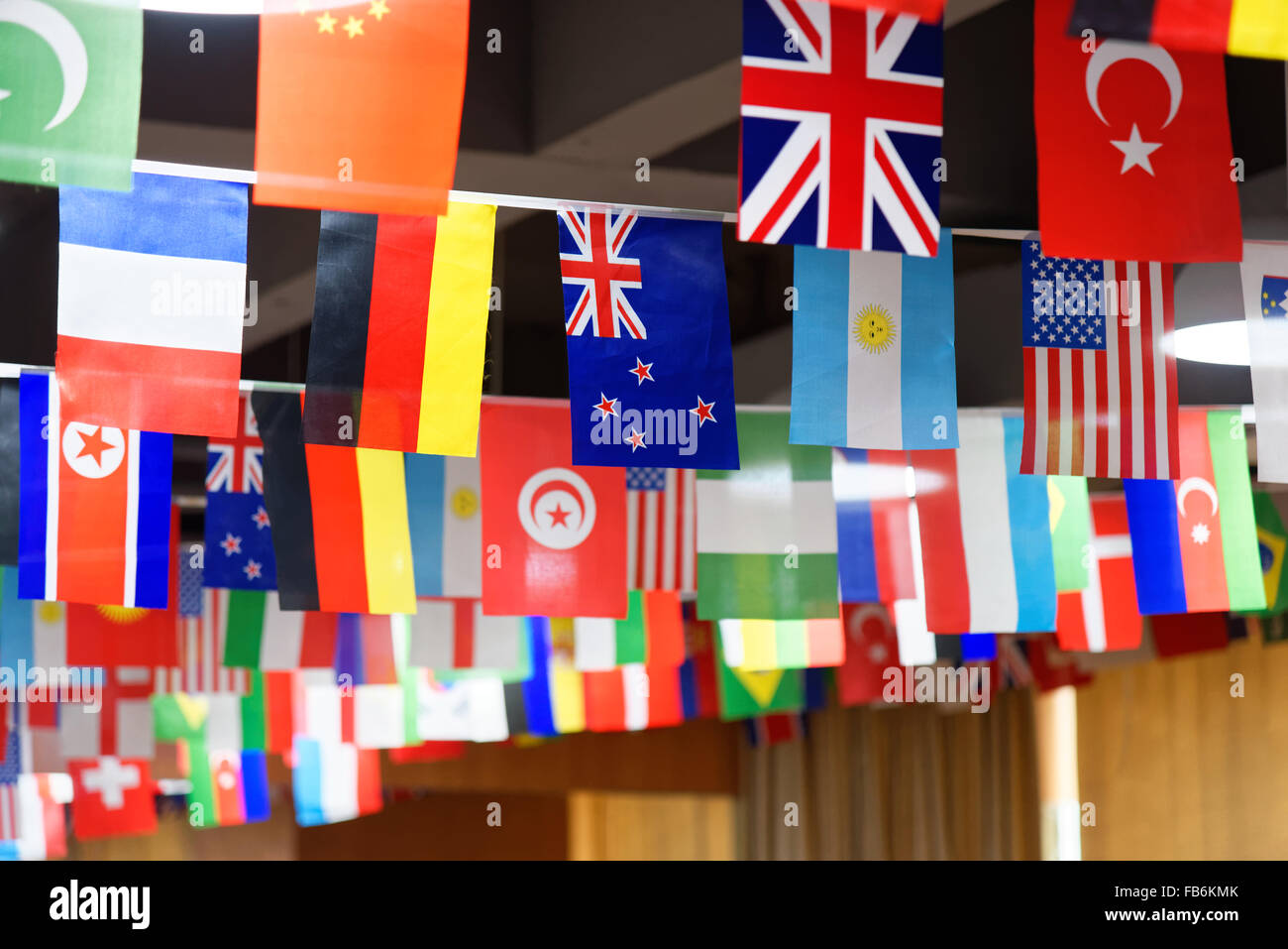 Many countries flags on a rope Stock Photo - Alamy