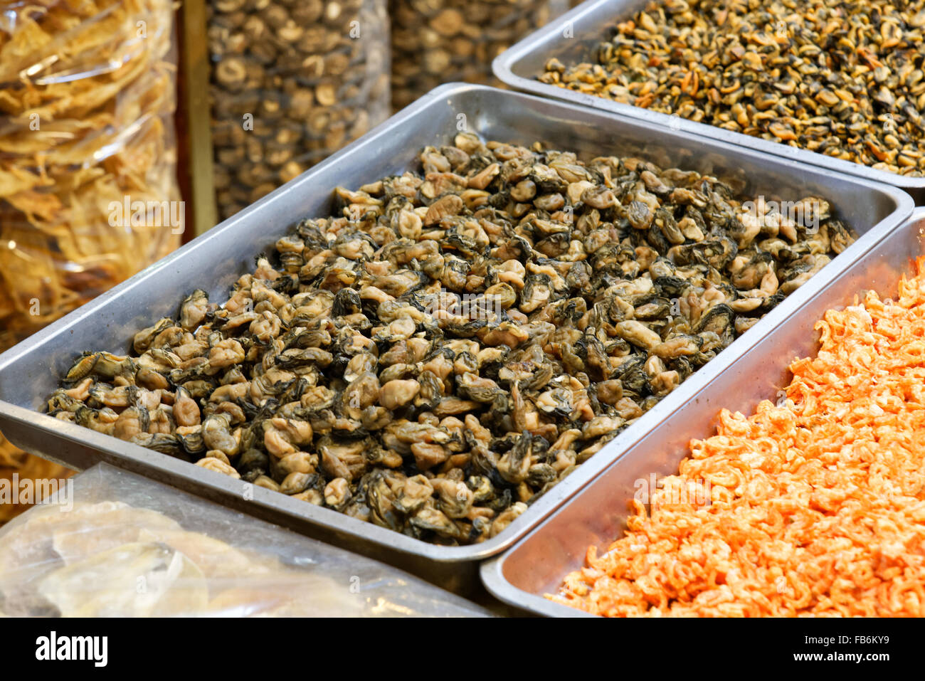 Pile of dried mussel on a market shelf Stock Photo - Alamy