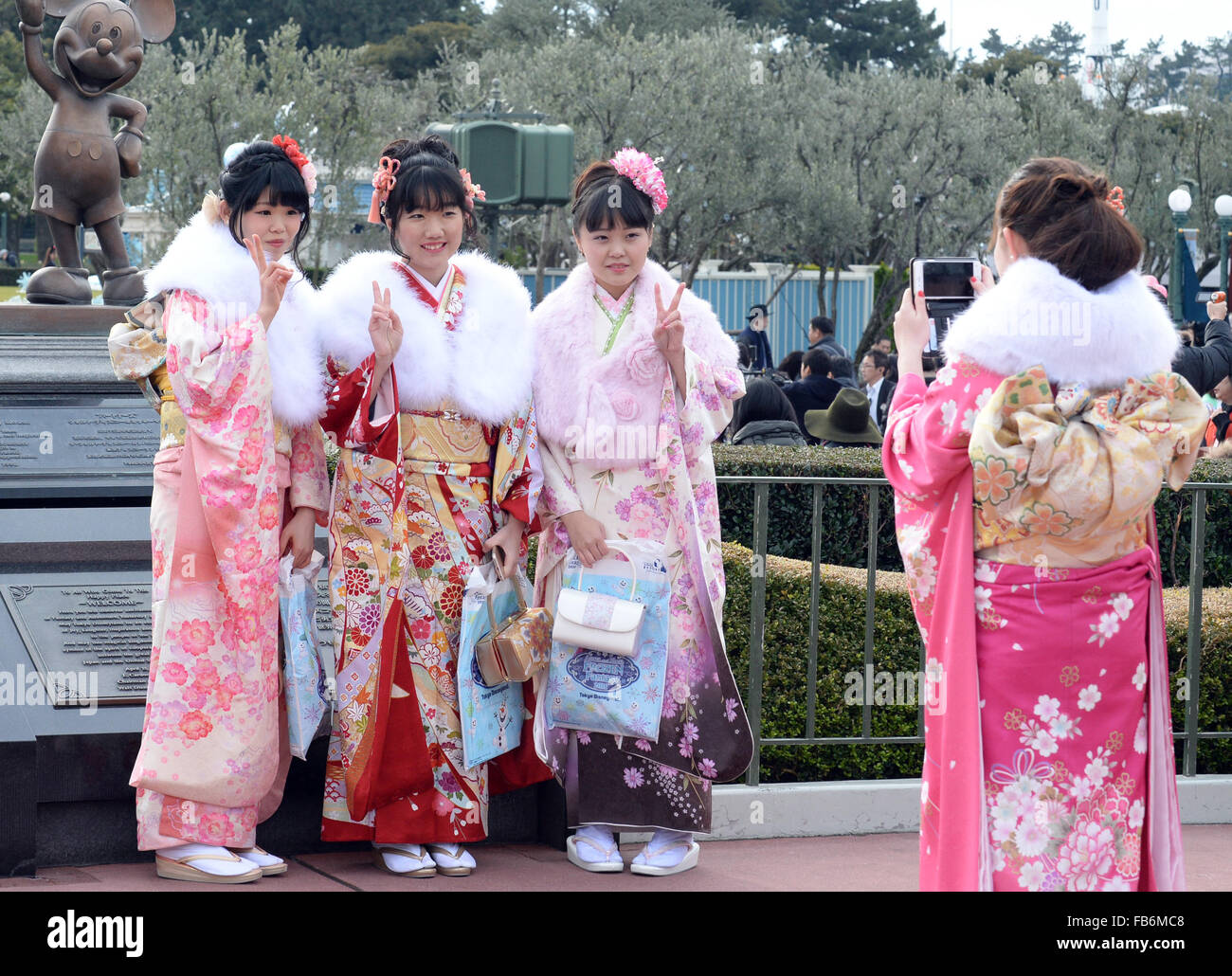 Tokyo, Japan. 11th Jan, 2016. Japanese girls wearing kimonos pose for ...