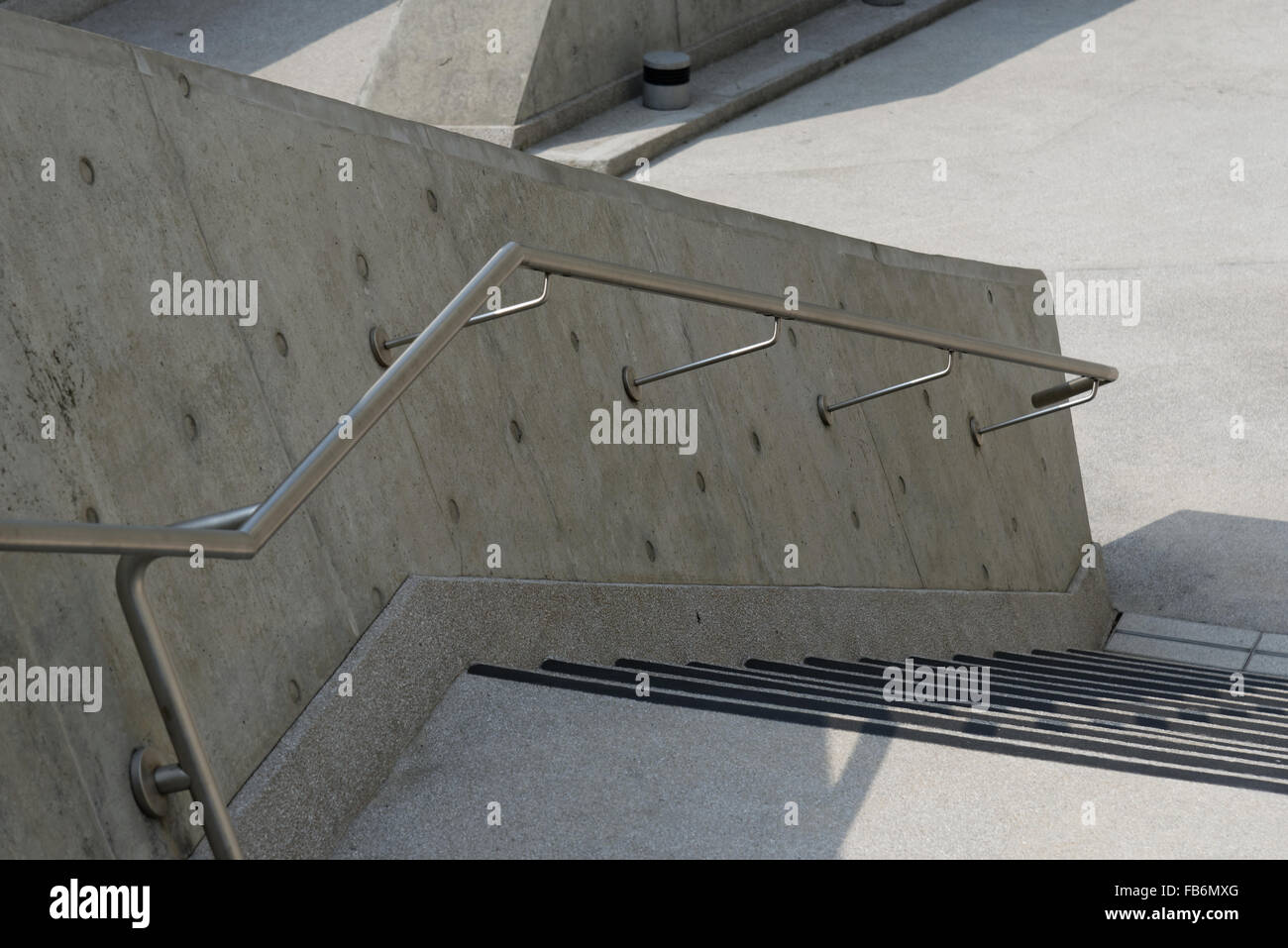 metal handrail on a concrete wall Stock Photo - Alamy