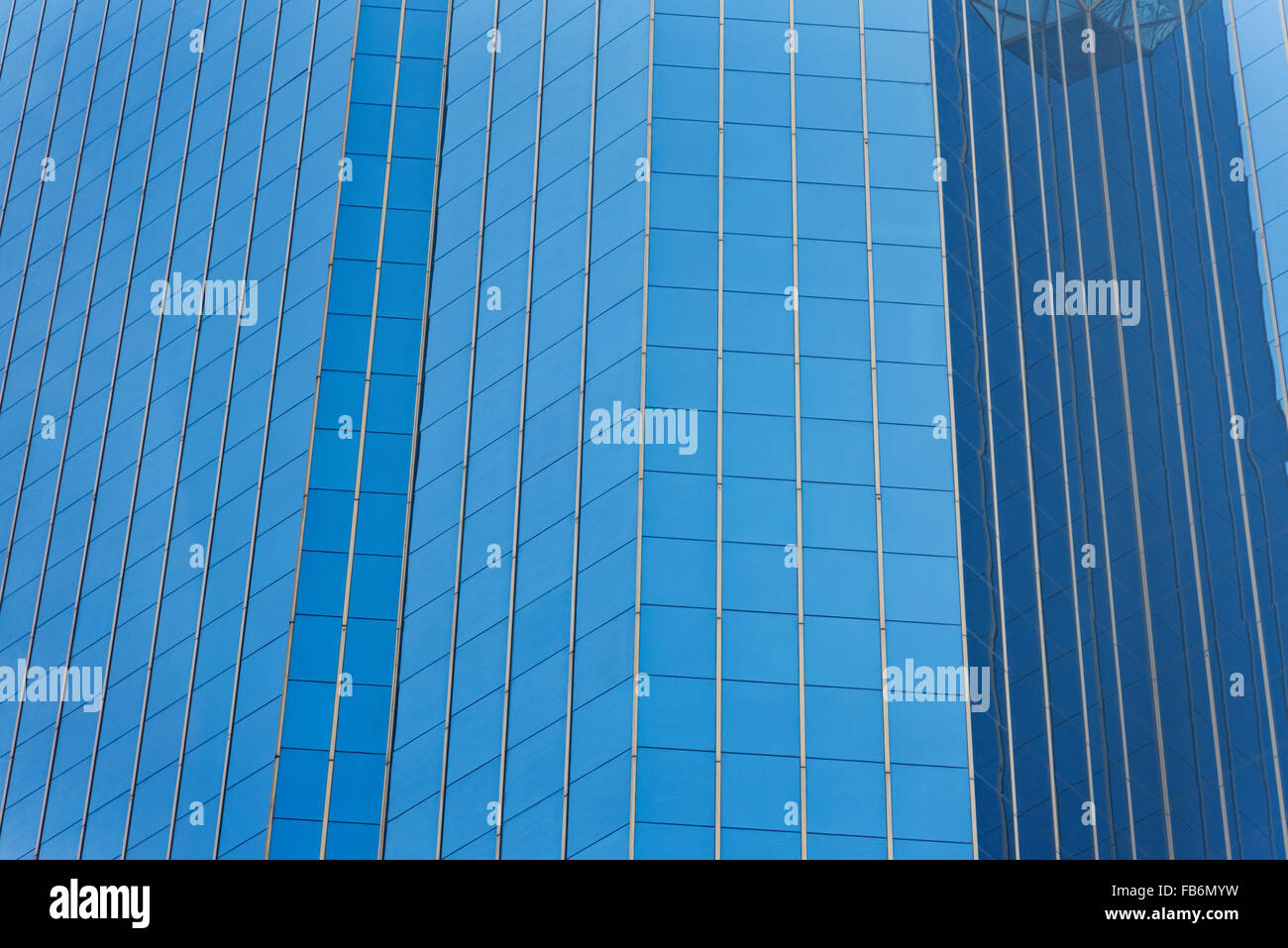Blue glass skyscraper windows Stock Photo - Alamy