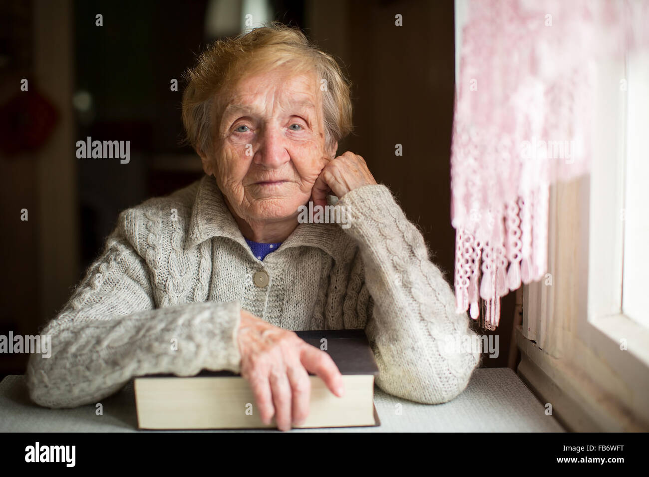 Indian old woman reading book hi-res stock photography and images - Alamy