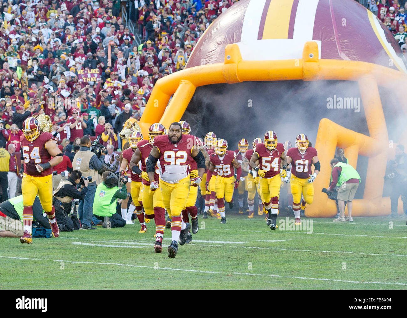The Washington Redskins, led by Washington Redskins defensive end Chris ...