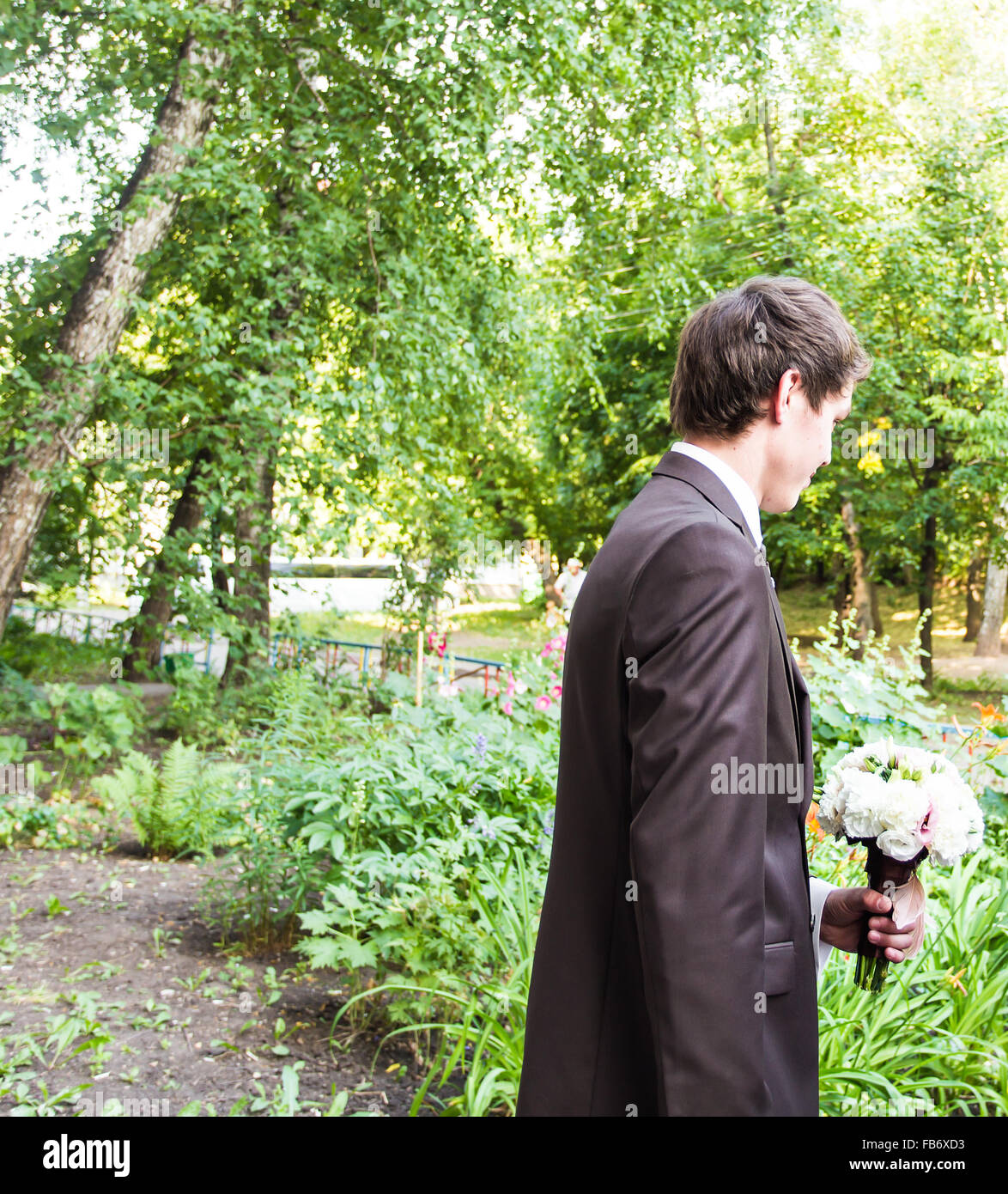 young man waiting woman. Groom wait for bride Stock Photo - Alamy