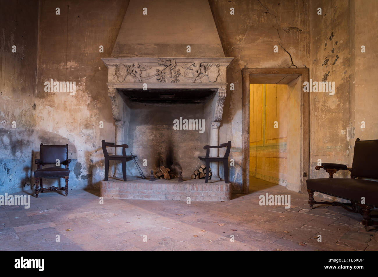 Old fireplace of an Italian castle Stock Photo - Alamy