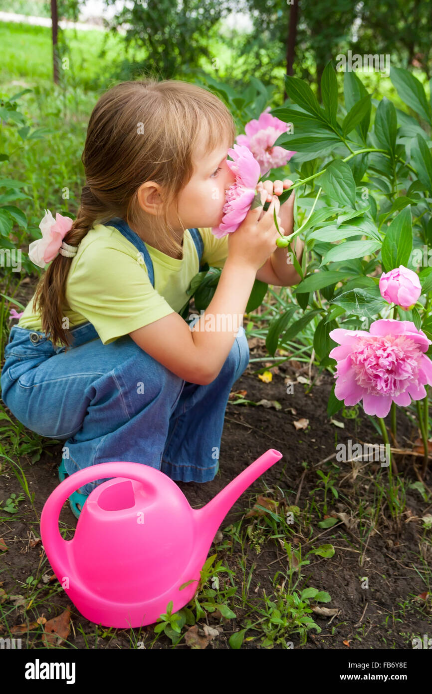little girl helping in the spring work, gardening Stock Photo - Alamy
