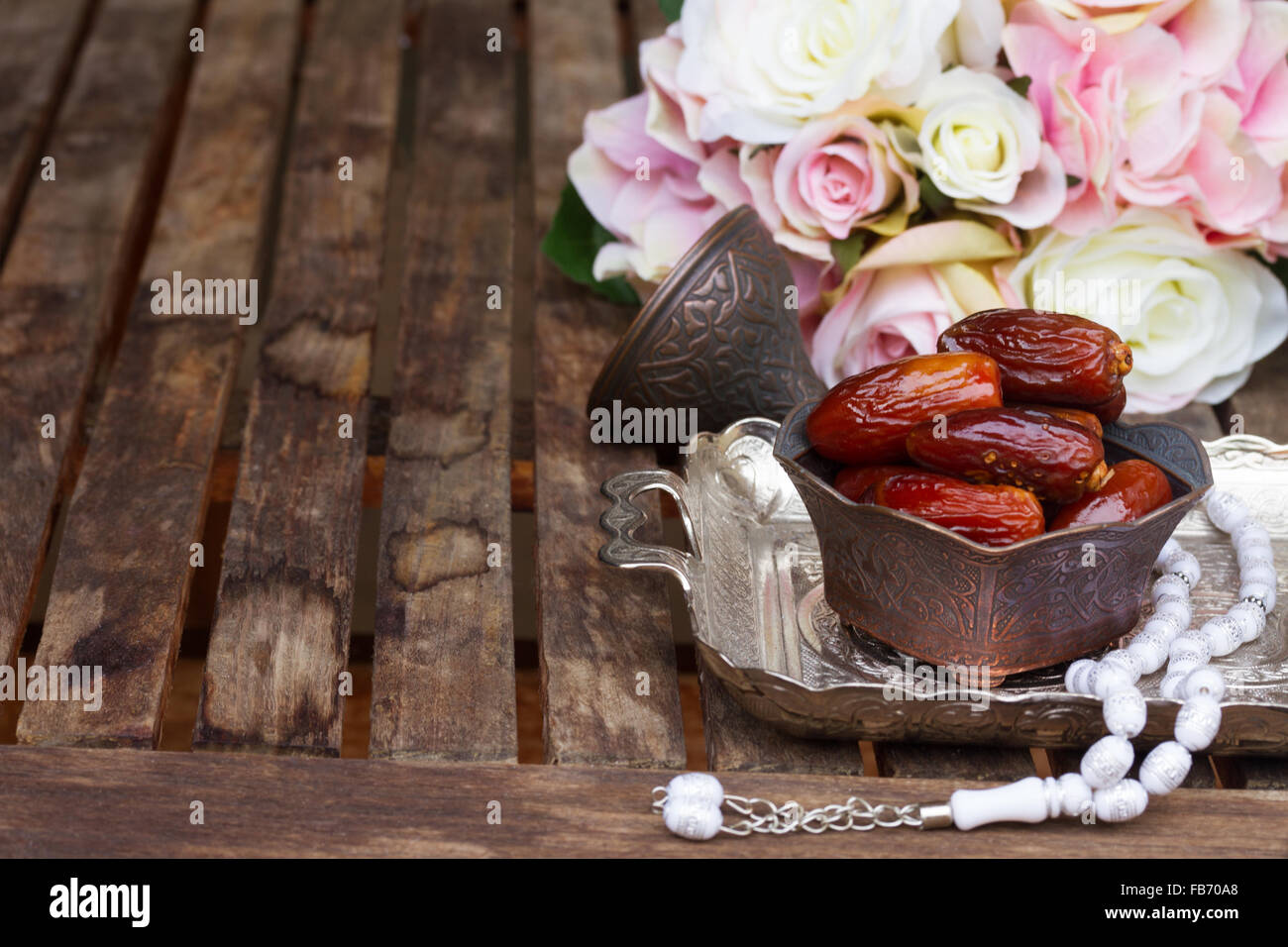 Date fruit with rosemary Stock Photo - Alamy