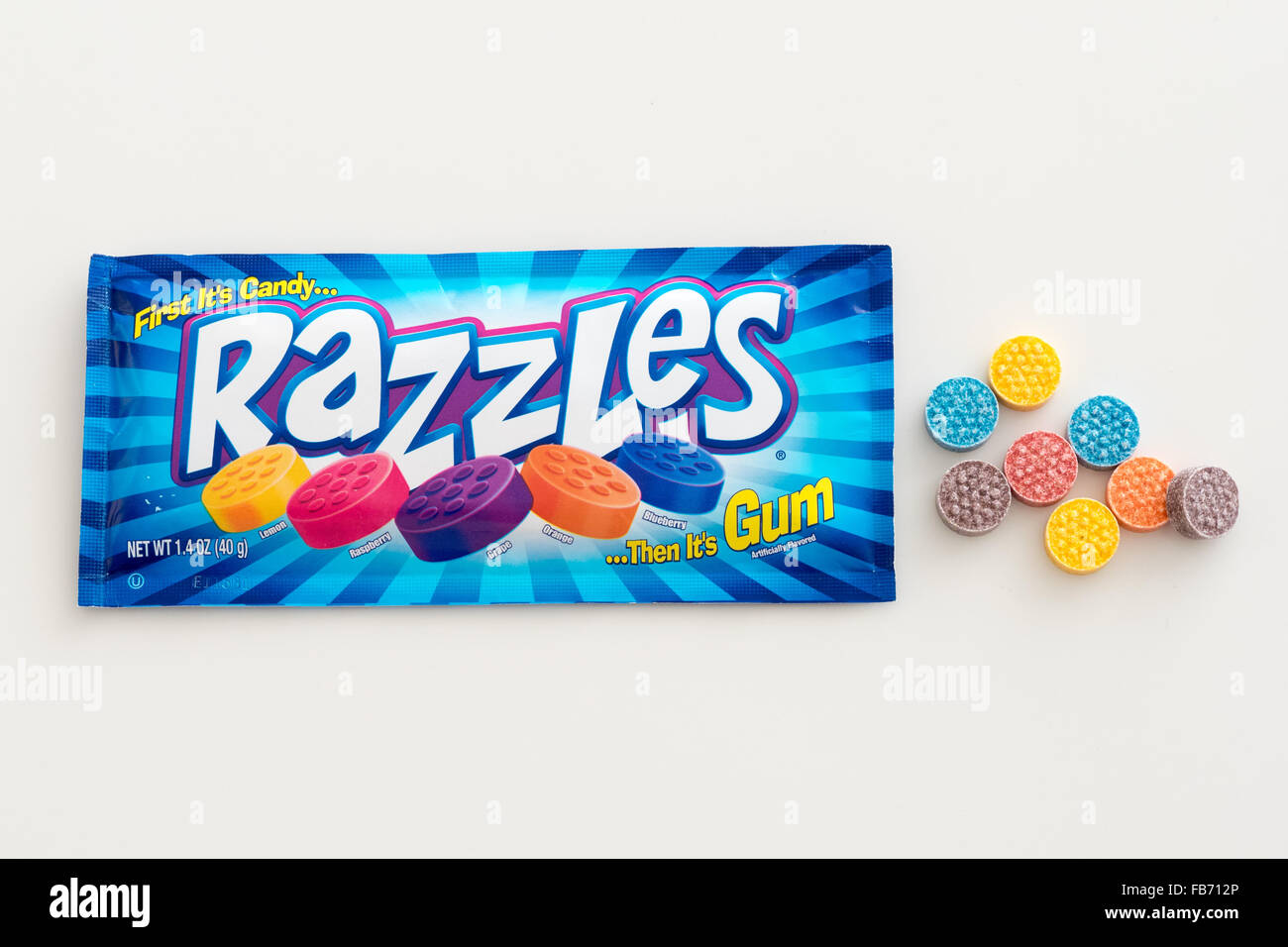 A packet of Razzles, a candy that once chewed, mixes to transform into ...
