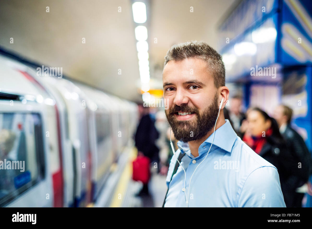 Young man in subway Stock Photo - Alamy
