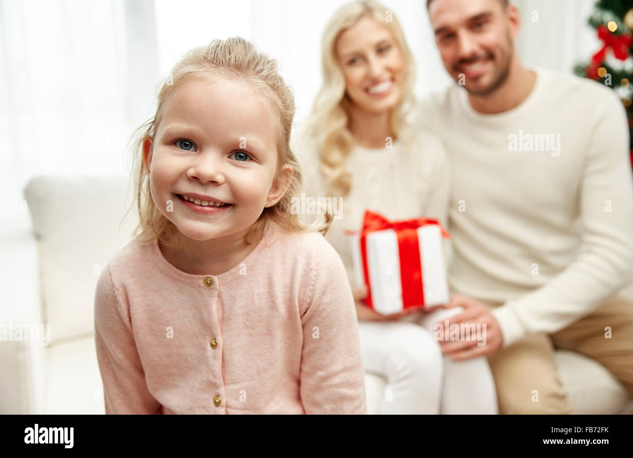 happy family at home with christmas gift box Stock Photo - Alamy
