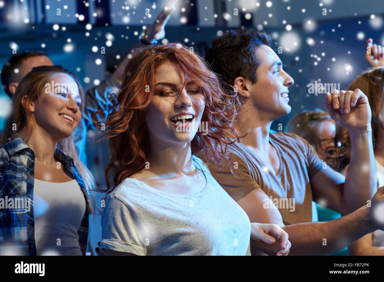 happy friends dancing at night club Stock Photo - Alamy