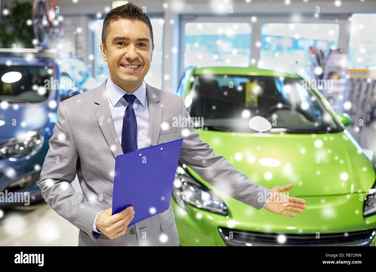 happy man at auto show or car salon Stock Photo - Alamy