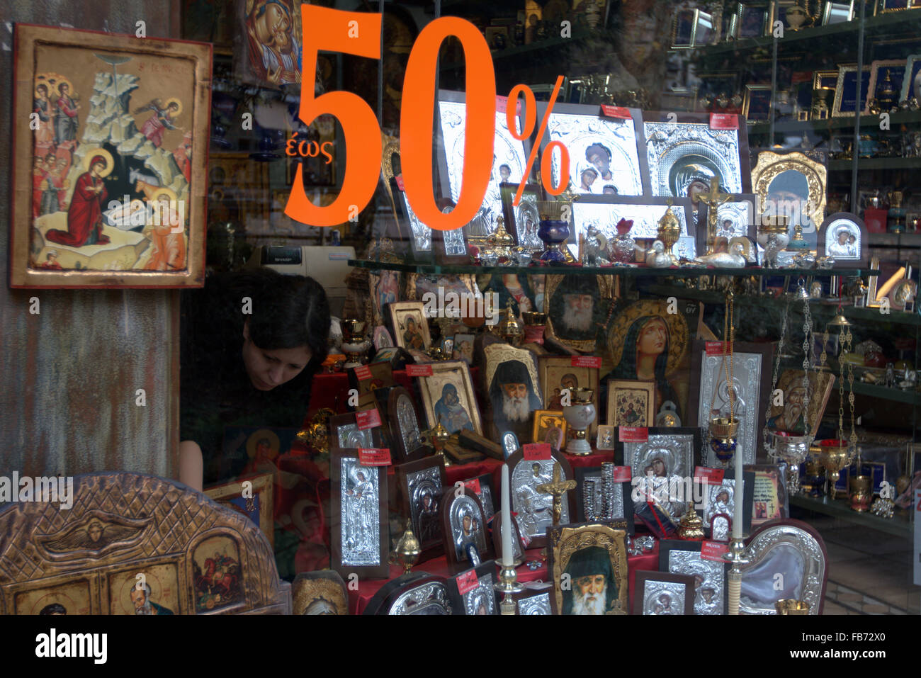 Greek orthodox shop icons shopkeeper woman hi-res stock photography and ...