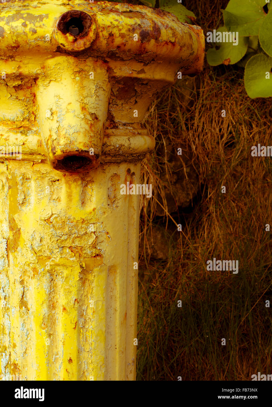 A yellow drinking fountain in Roberts Cove, County Cork, Ireland Stock ...