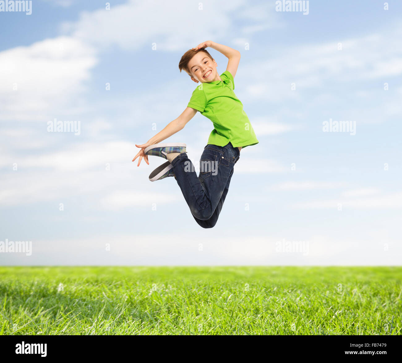 Young teenage boy jumping joy hi-res stock photography and images - Alamy
