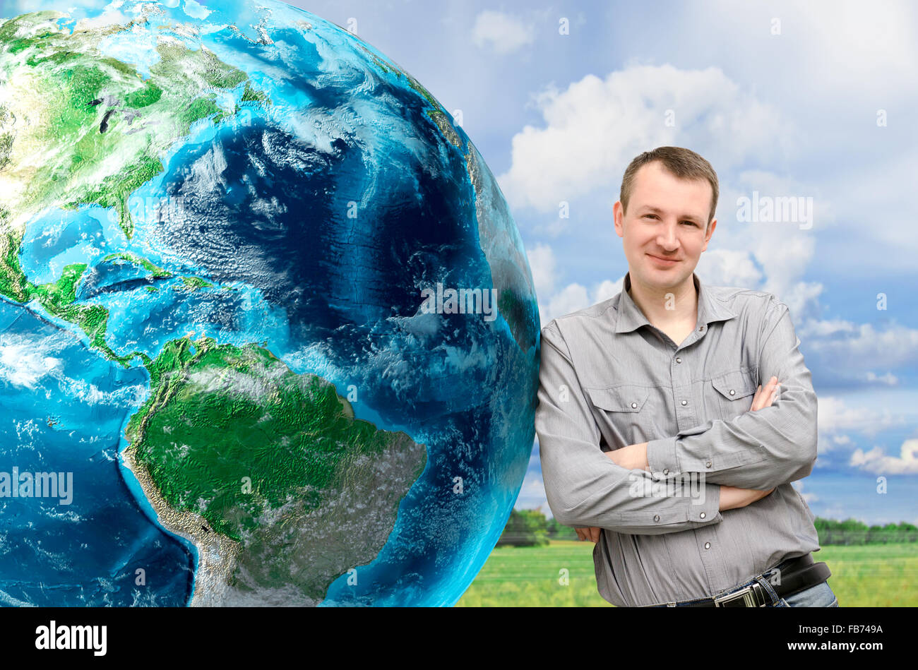 man of leaning on huge Earth planet . Elements of this image furnished ...