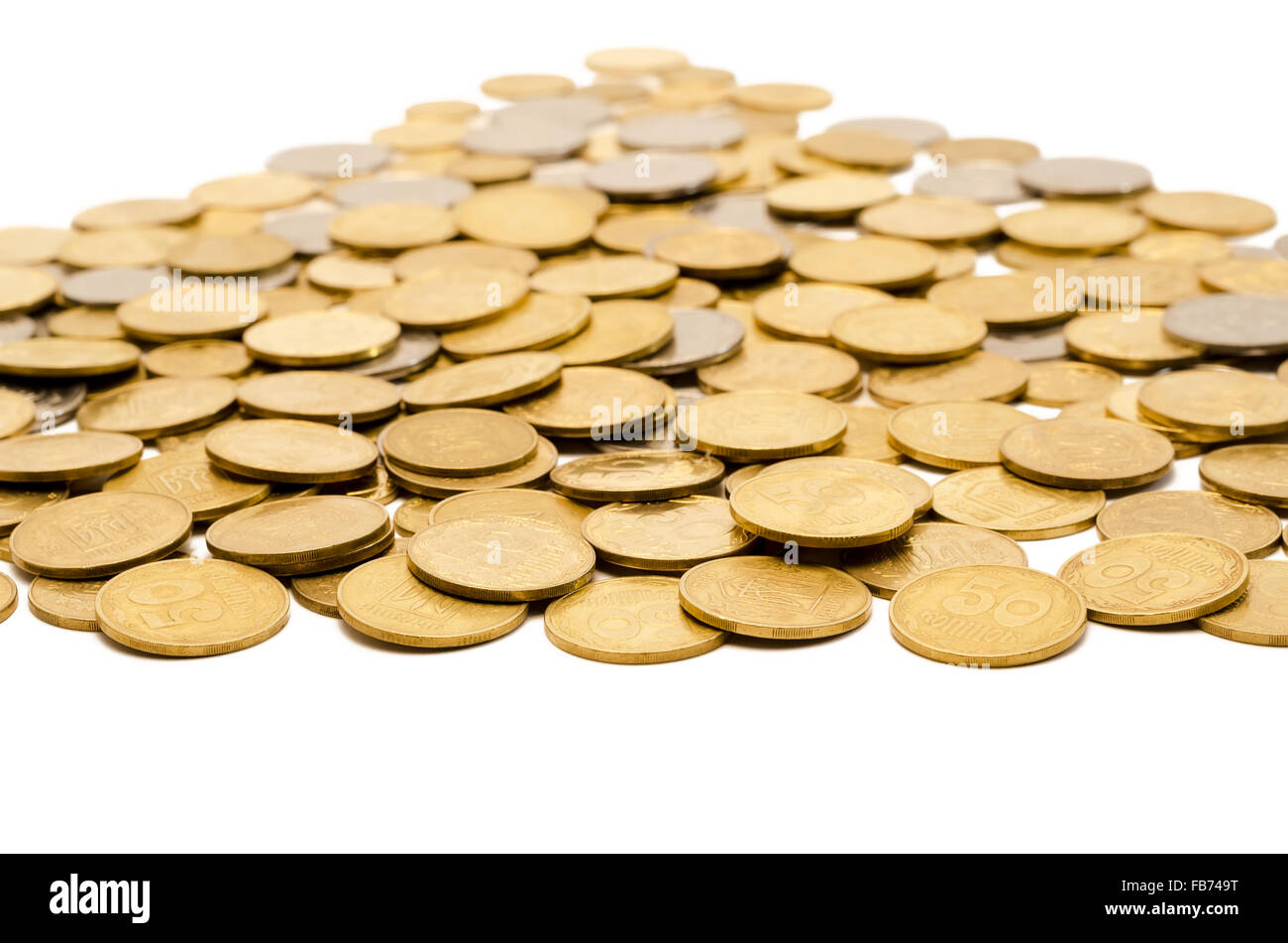 big quantity of coins yellow and gray Stock Photo - Alamy