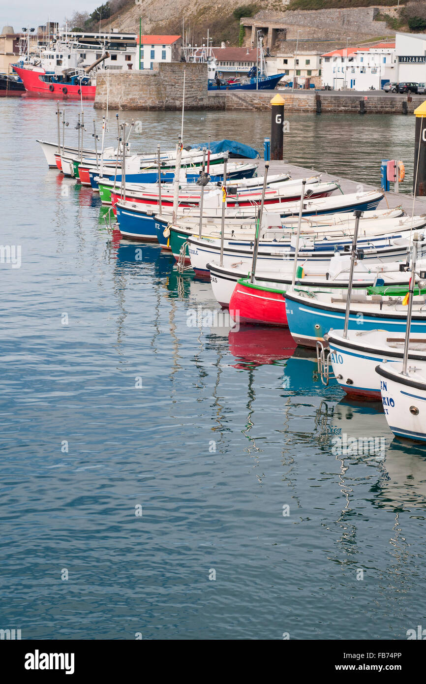 Vertical scene of Getaria port with old fishermans boats. Basque ...