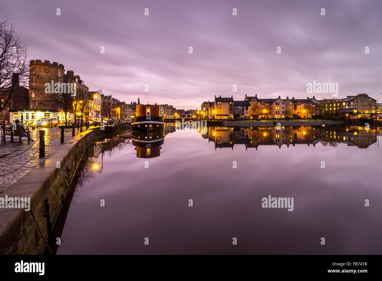Reflections of building in the water at Leith, Edinburgh Stock Photo ...