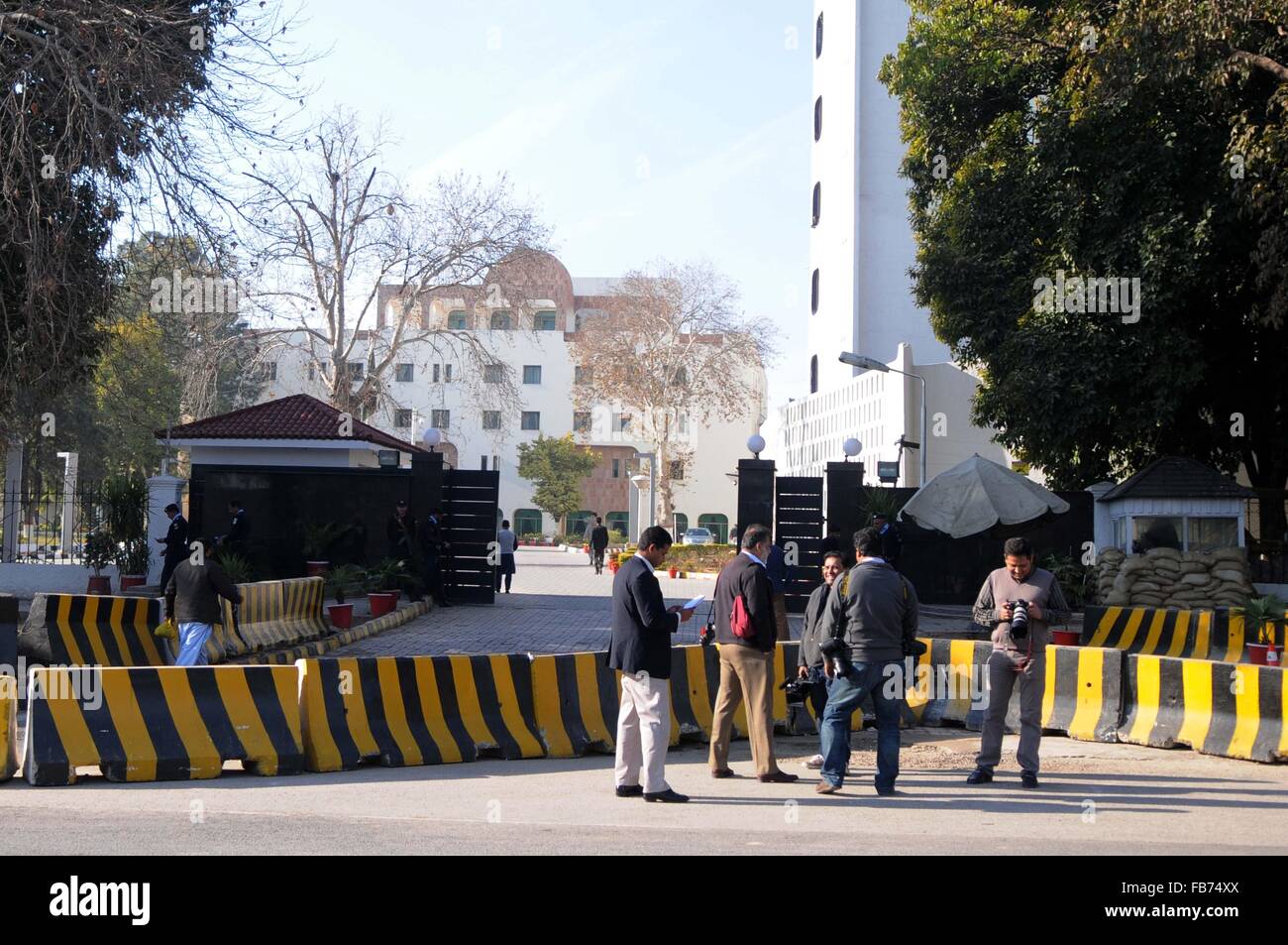 Islamabad, Pakistan. 11th Jan, 2016. Pakistani journalists wait outside ...