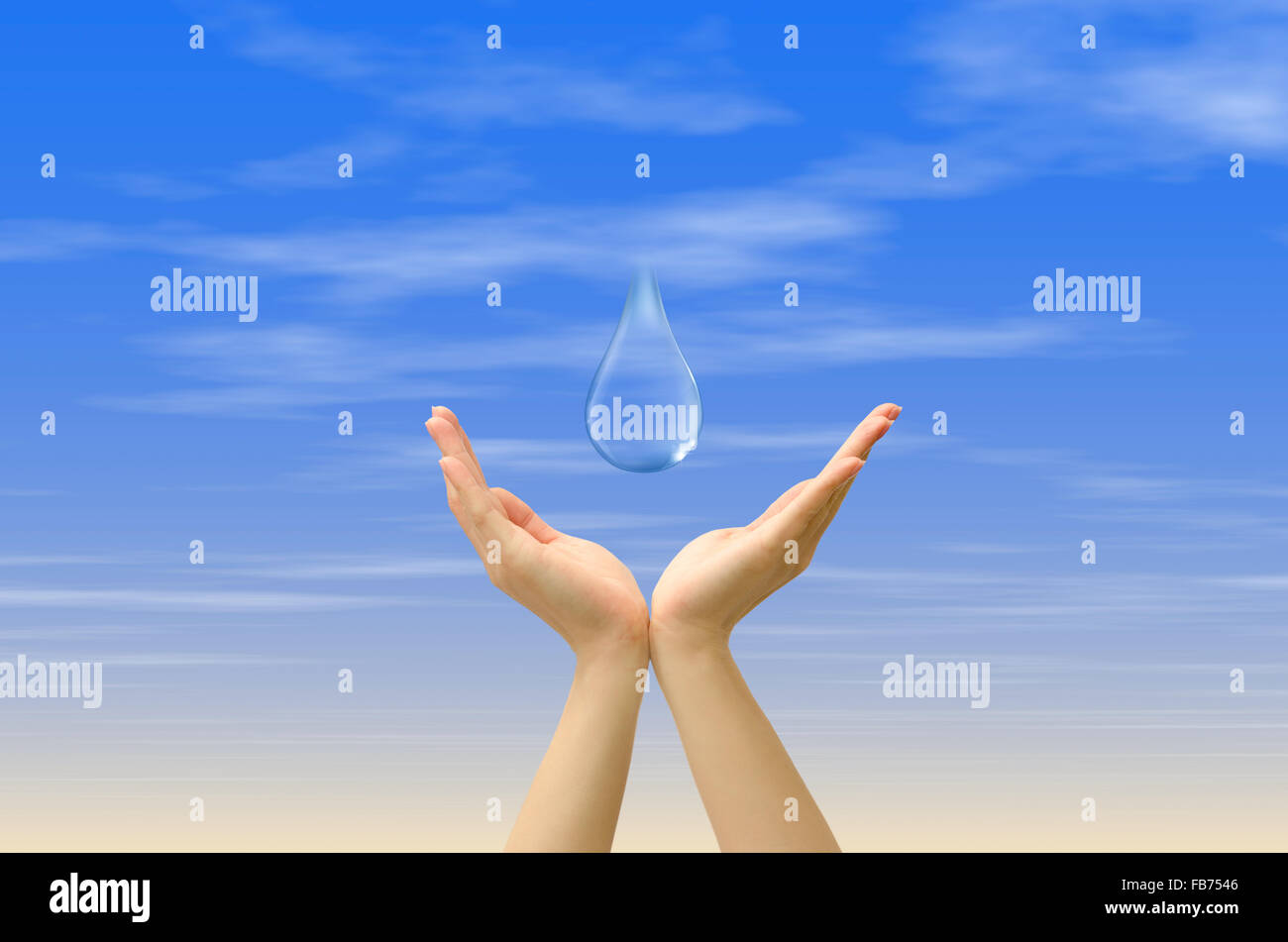 Hand holding water drop Stock Photo - Alamy
